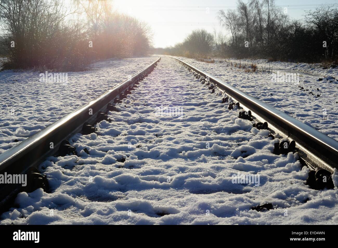Rail tracks in snow, converging Stock Photo - Alamy