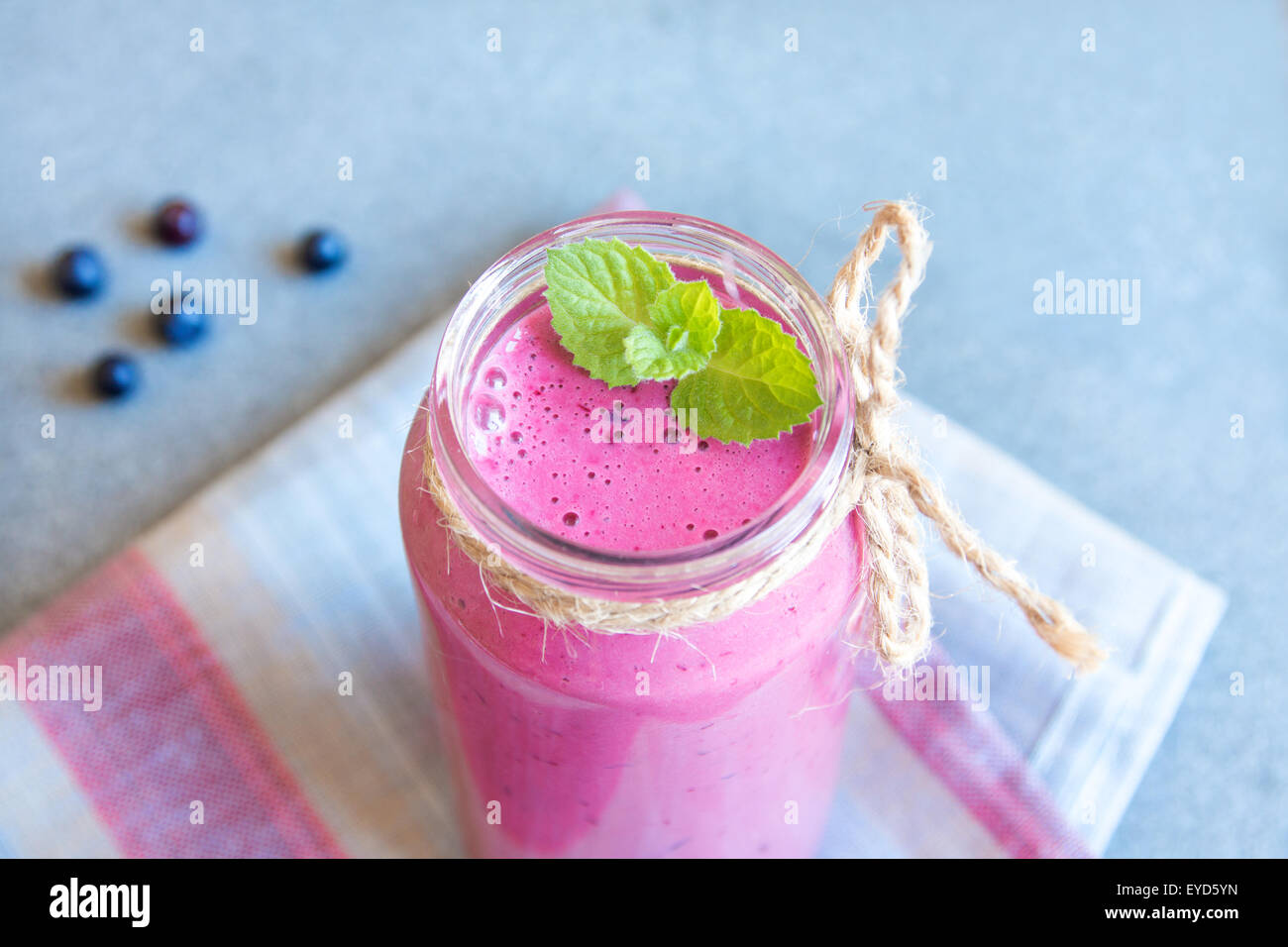 Blueberry smoothie with mint, organic healthy raw food Stock Photo - Alamy