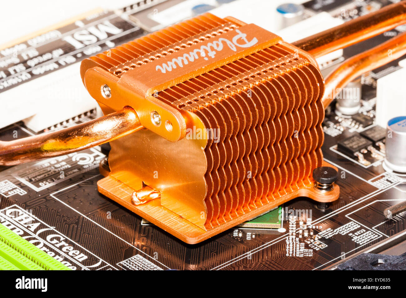 MSI home computer Intel motherboard. Large copper coloured heatsink in ...