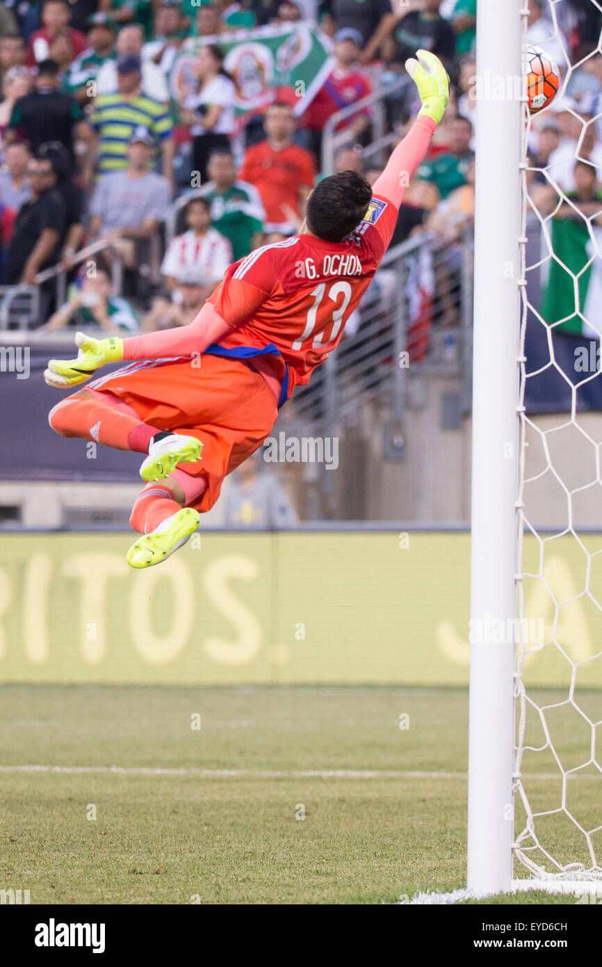 July 19, 2015: Mexico goalkeeper Guillermo Ochoa (13) goes flying for ...