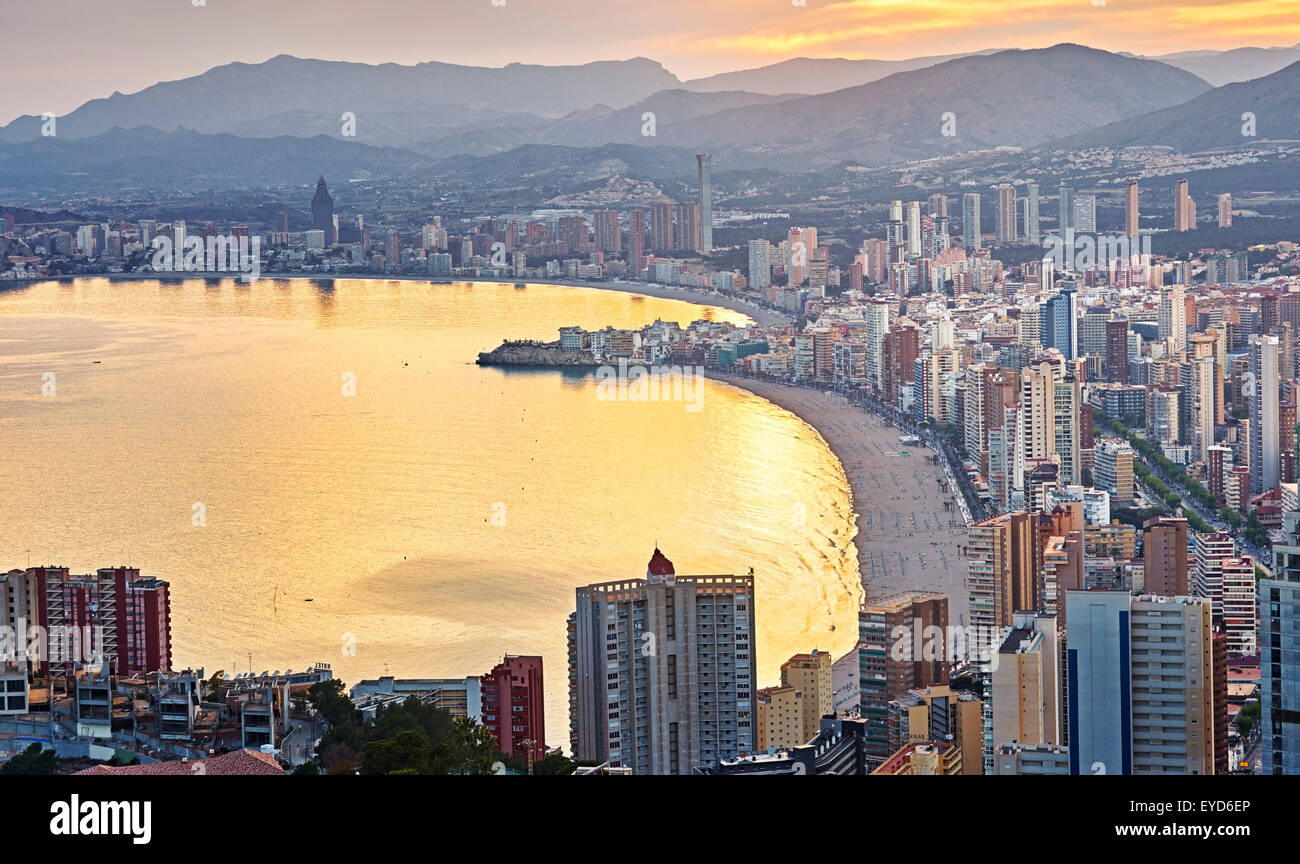 Aerial view of the beach and the skyline by sunset. Benidorm. Alicante ...