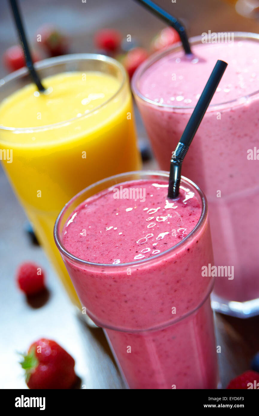 Three colourful healthy smoothies Stock Photo - Alamy