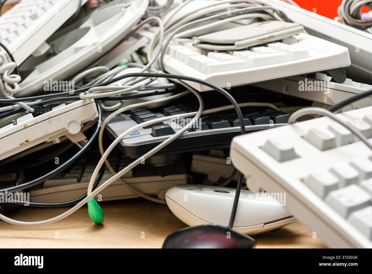 Junked computers stored in room. Piles of stacked white obsolete ...
