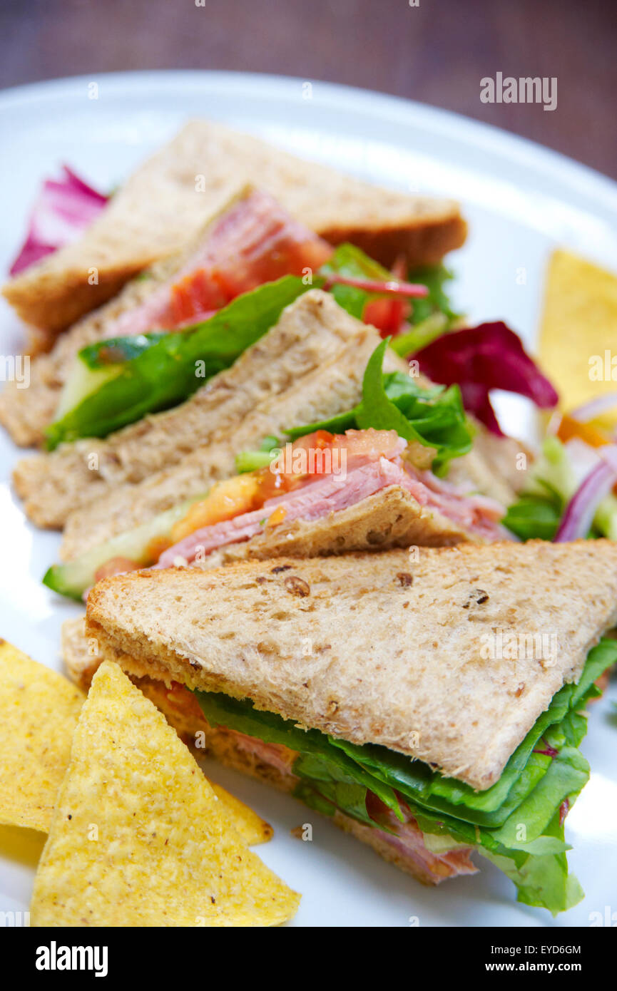 Ham and salad sandwiches cut into triangles Stock Photo - Alamy