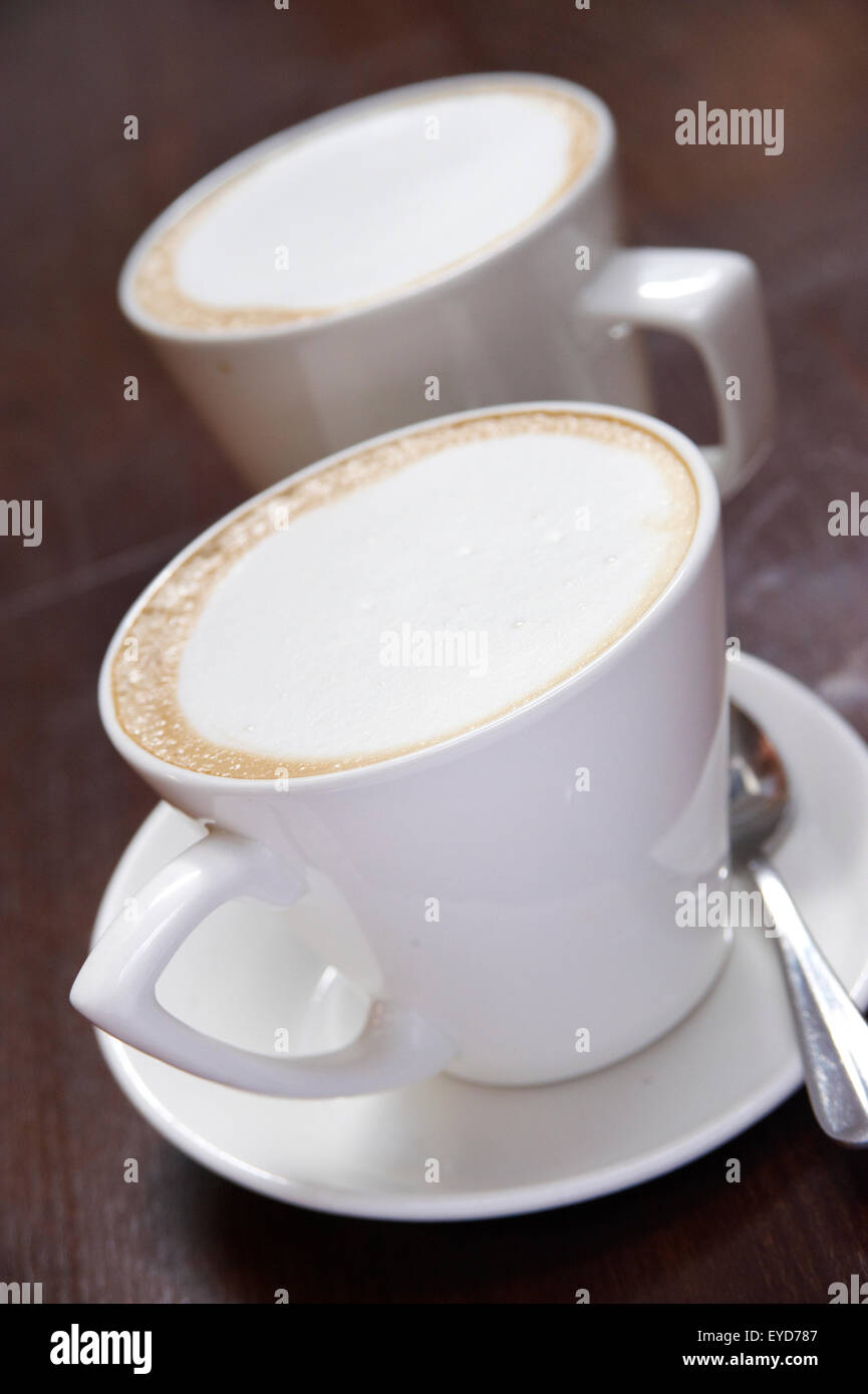 Two cups of cappuccino Stock Photo - Alamy