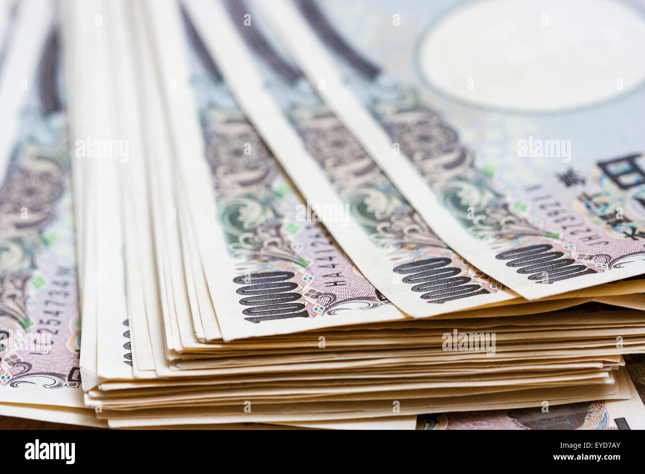 Japanese money, 10,000 yen banknotes. Close up of pile or stash of bank ...