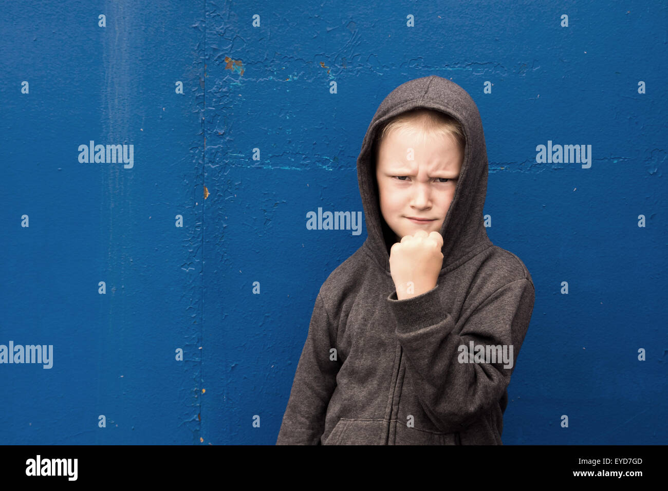 angry aggressive boy (child) shows his fist, threatening Stock Photo ...