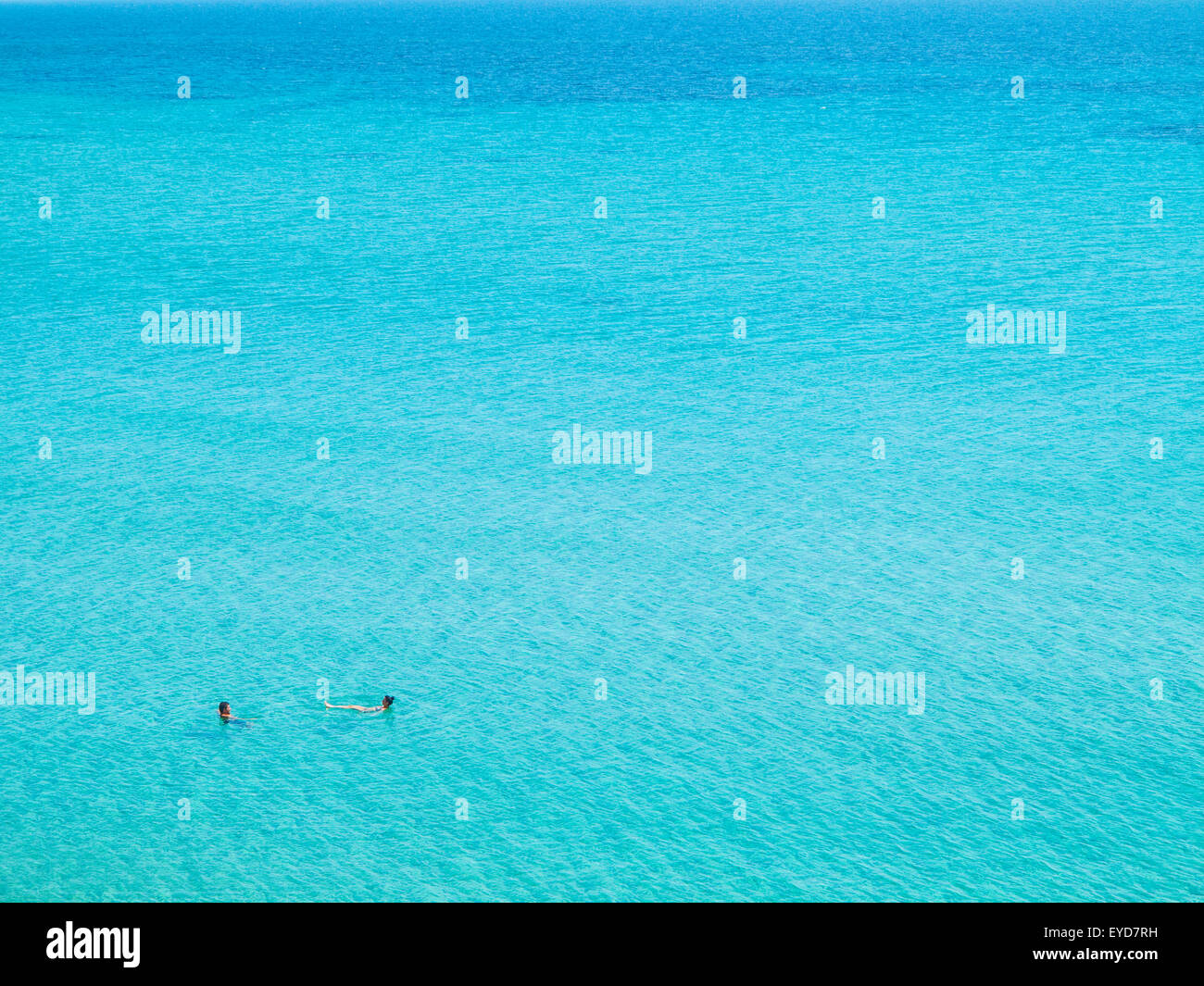 Swimming in the azure sea hi-res stock photography and images - Alamy