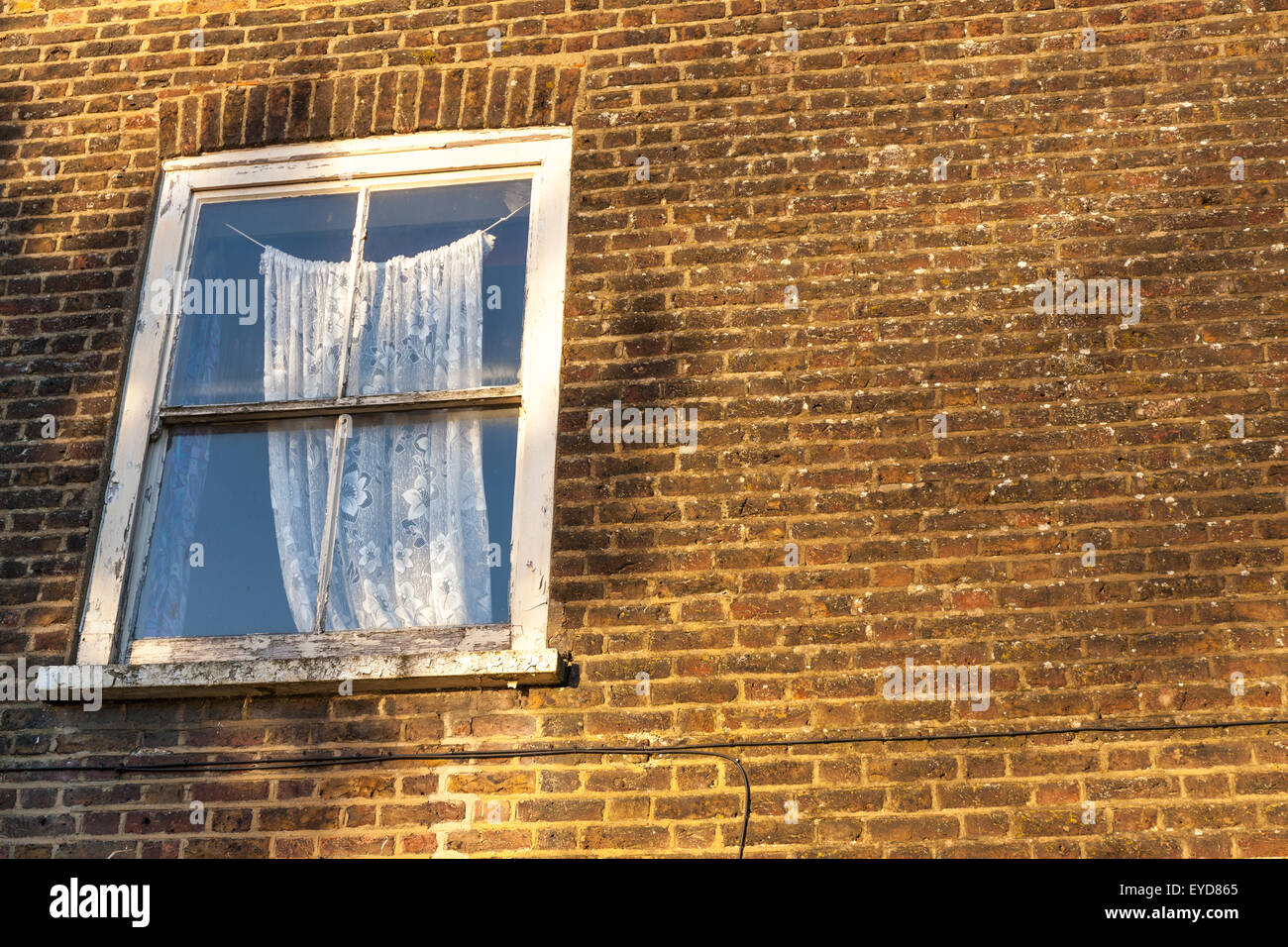 Hanging by a string Stock Photo - Alamy