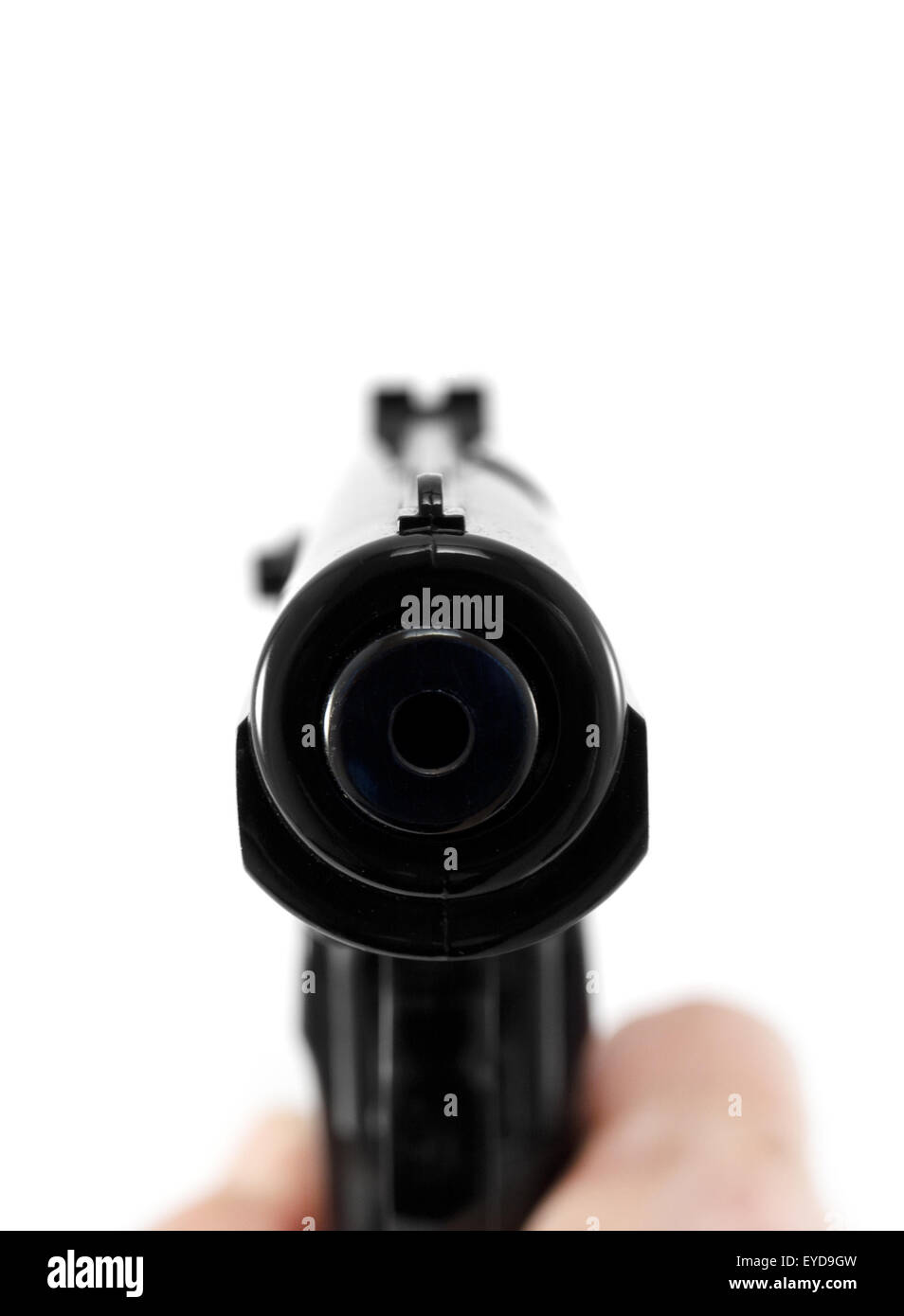Gun in the hand isolated on white background Stock Photo - Alamy