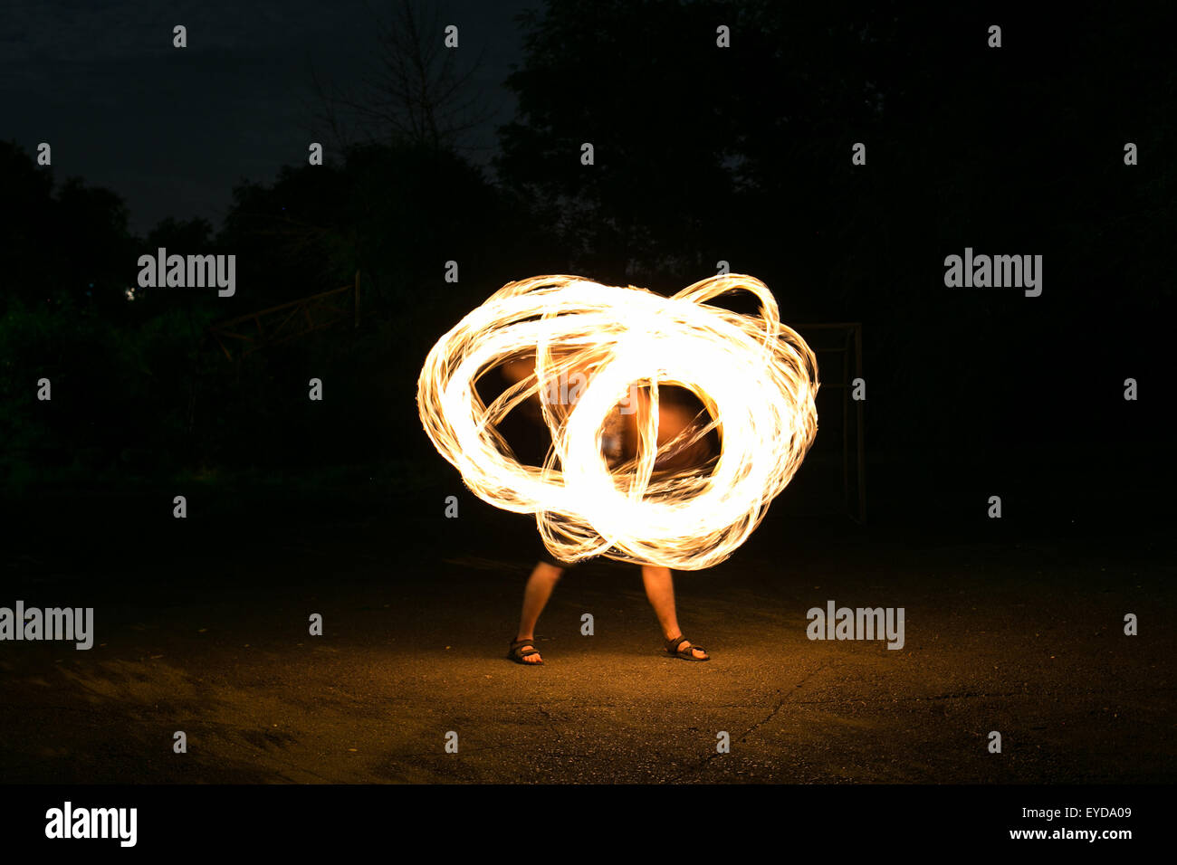 Fire-show man in action Stock Photo - Alamy