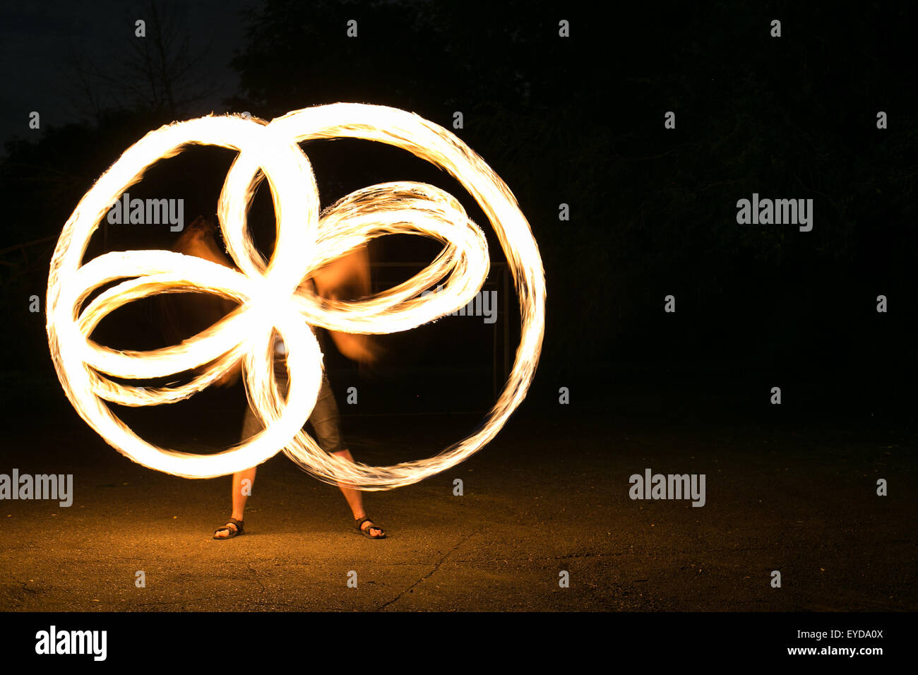 Fire-show man in action Stock Photo - Alamy