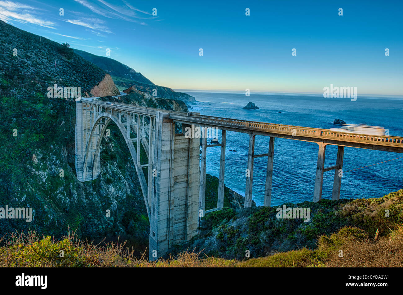 A solitary van crosses the Bixby Bridge at first light - Big Sur, CA ...