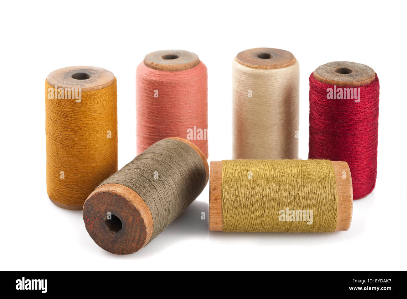 Colored spools of cotton thread isolated on white Stock Photo - Alamy