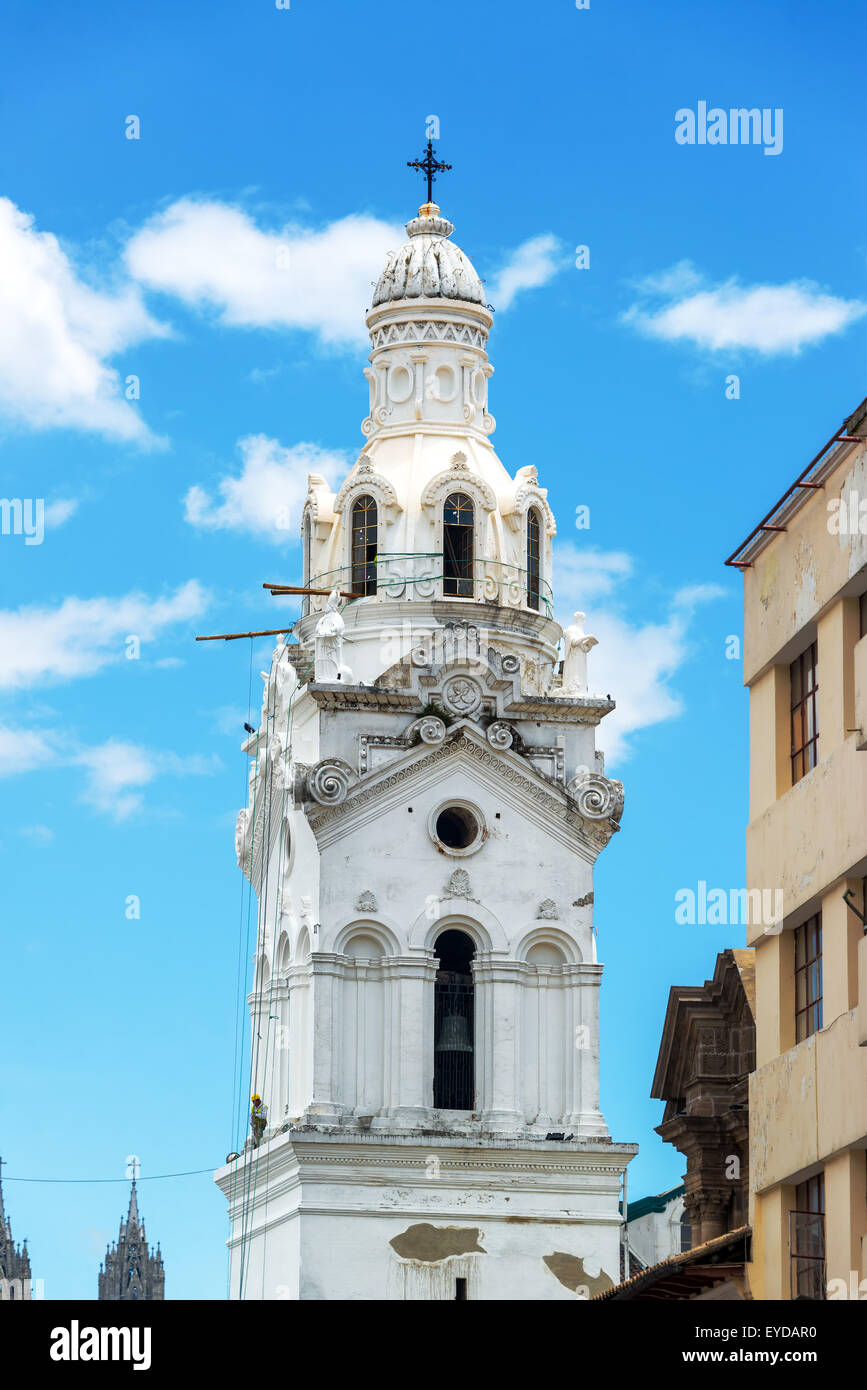 White spire of a church in the colonial center of Quito, Ecuador Stock ...
