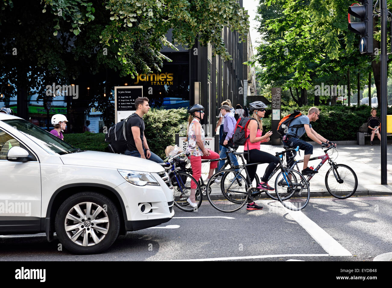 Commuter cyclists in advanced stop lane alongside illegally positioned ...