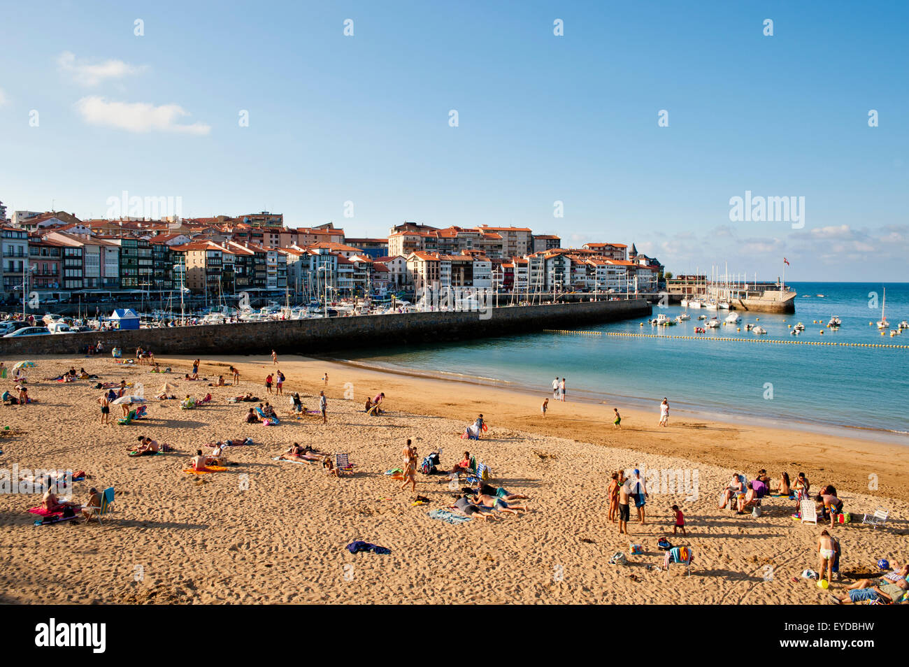 Incidental People Sunbathing On The Beach At Lekeitio, Basque Country ...