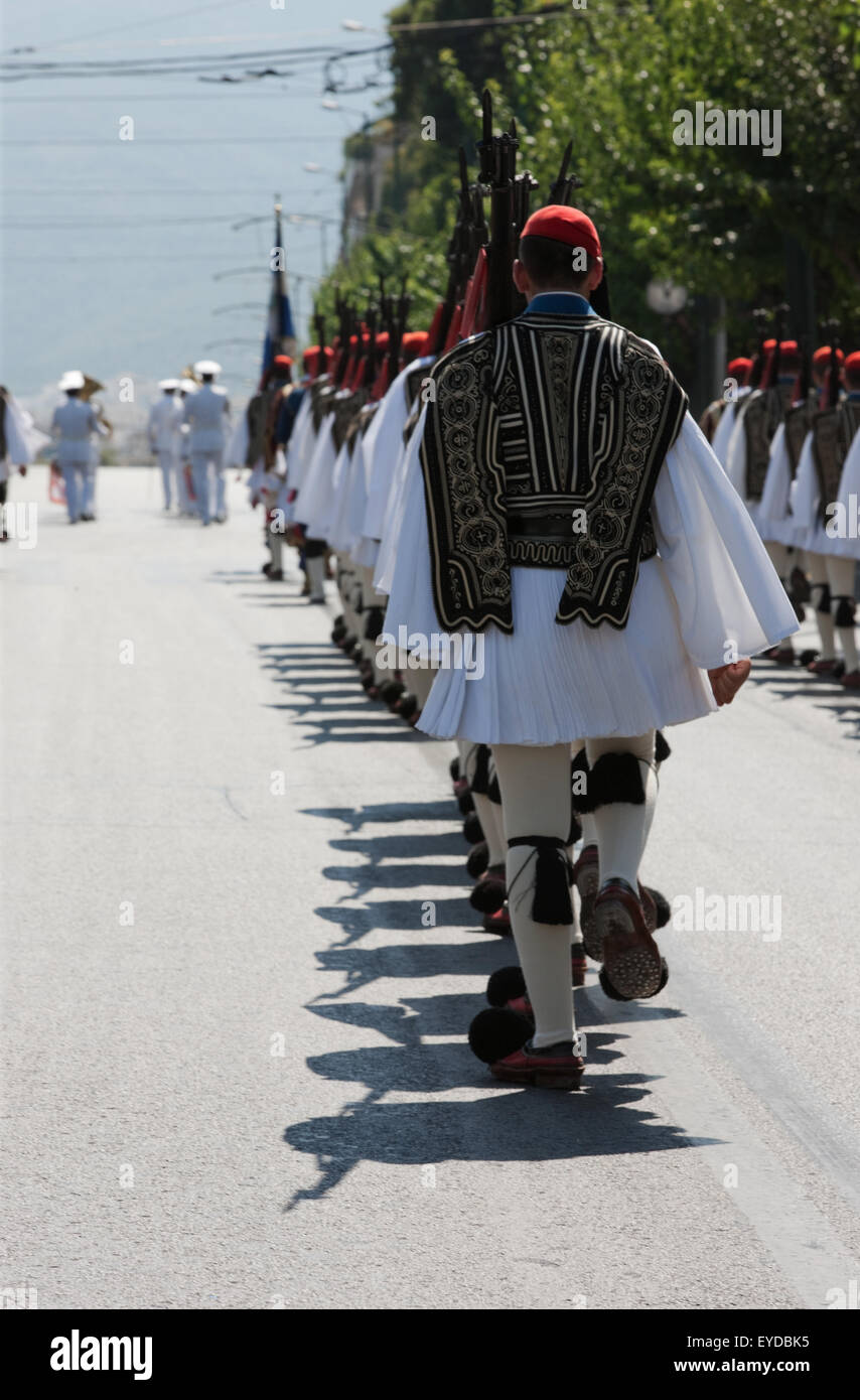 Back view of the Greek presidential guards following the music marching ...