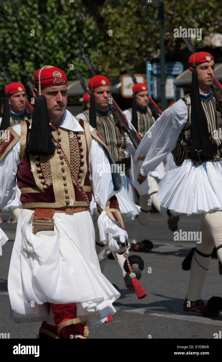 Vertical shot of Greek presidential guards marching after the end of a ...