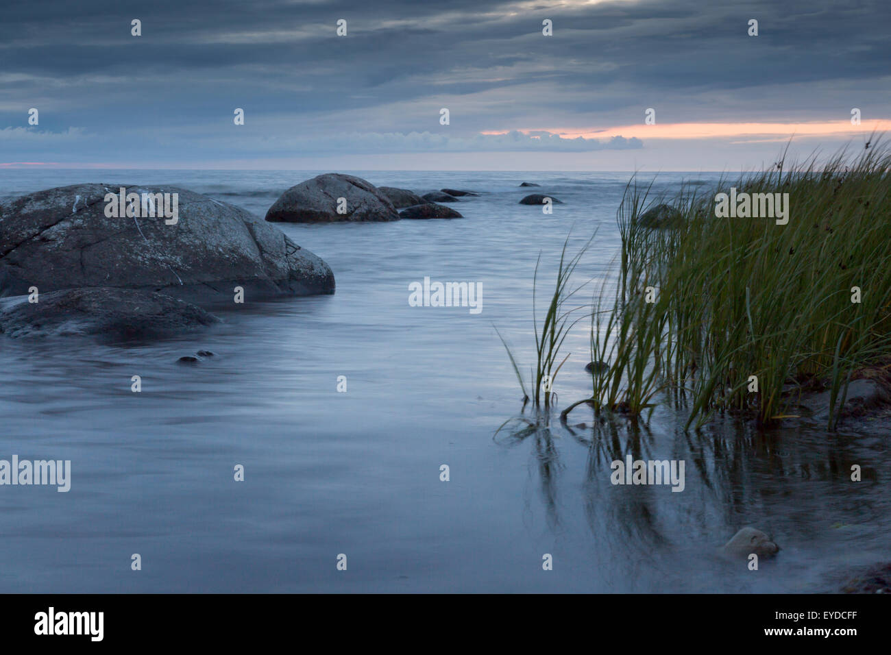 Flat sea with rocks hi-res stock photography and images - Alamy