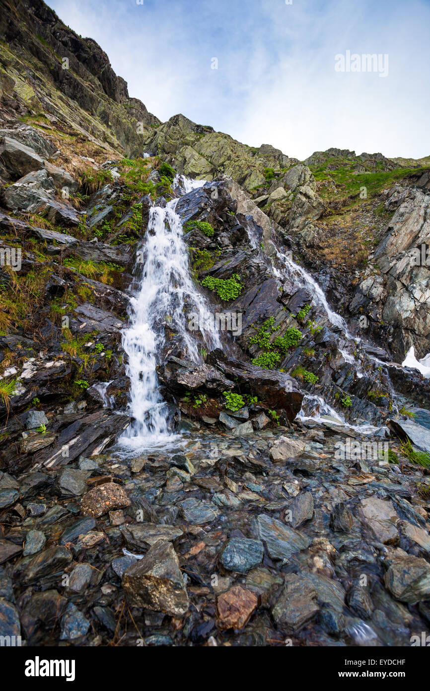 River waterfall flowing over rough rocks Stock Photo - Alamy