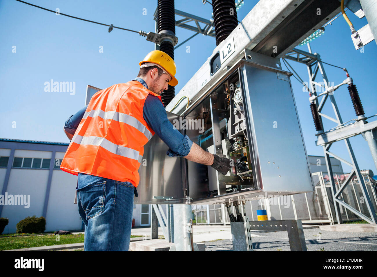 Engineer checking electricity substation Stock Photo - Alamy