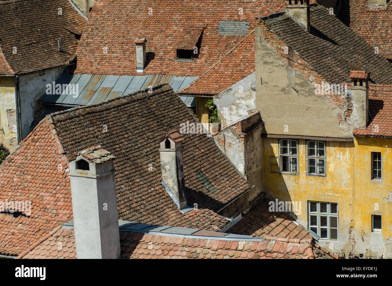 Sighișoara Historic rooftops showcase unique architecture in a charming ...