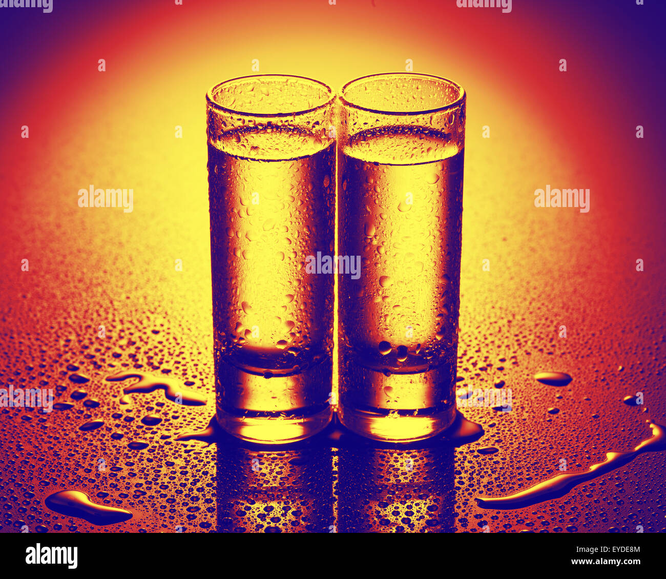 row of glasses for vodka Stock Photo - Alamy