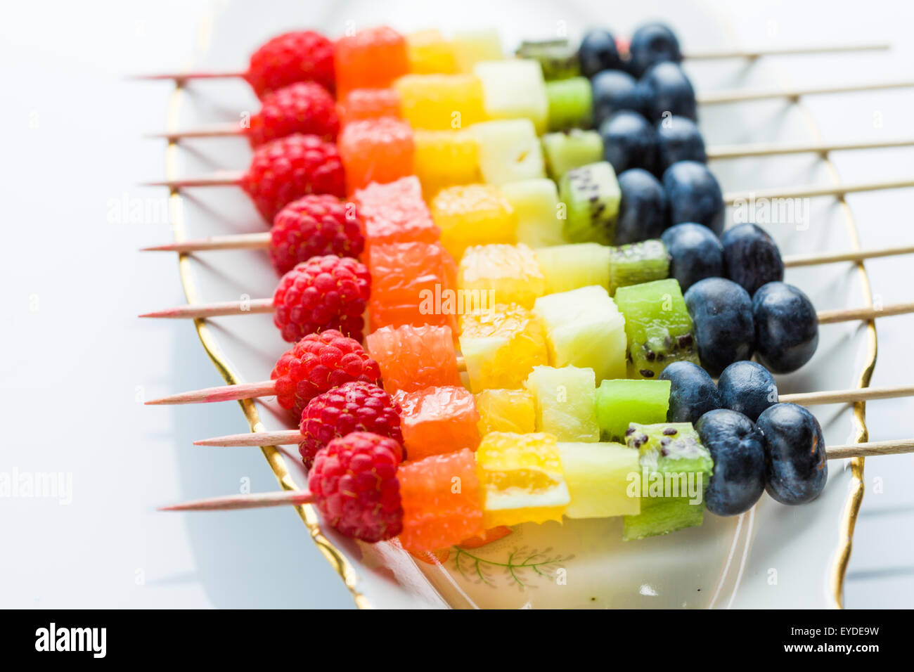 Fresh summer fruits on sticks Stock Photo - Alamy