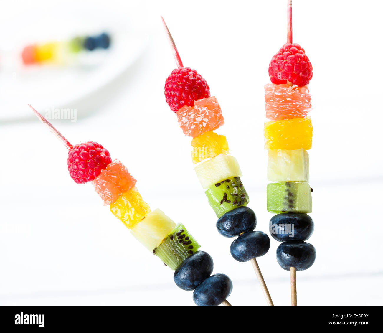 Fresh summer fruits on sticks Stock Photo - Alamy