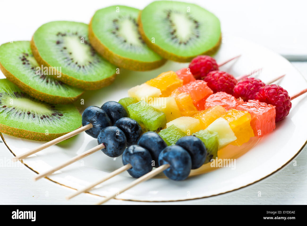 Fresh summer fruits on sticks Stock Photo - Alamy