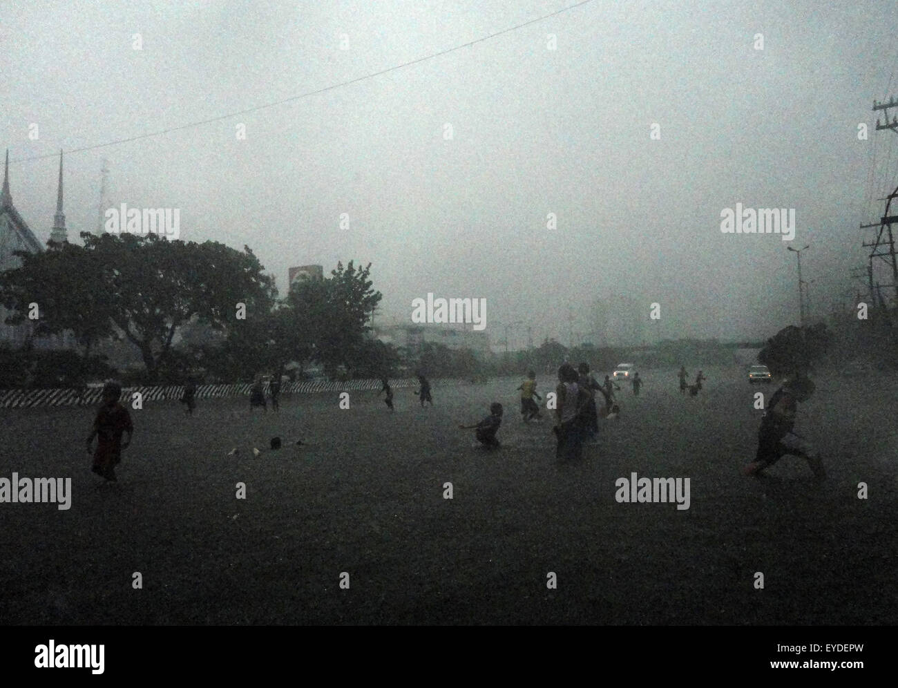 Filipino children play in rain hi-res stock photography and images - Alamy