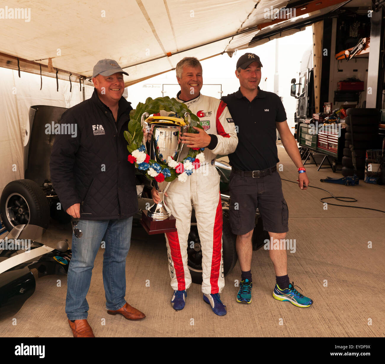 Tim Harvey posing with his pit crew was the winner of the Maserati ...