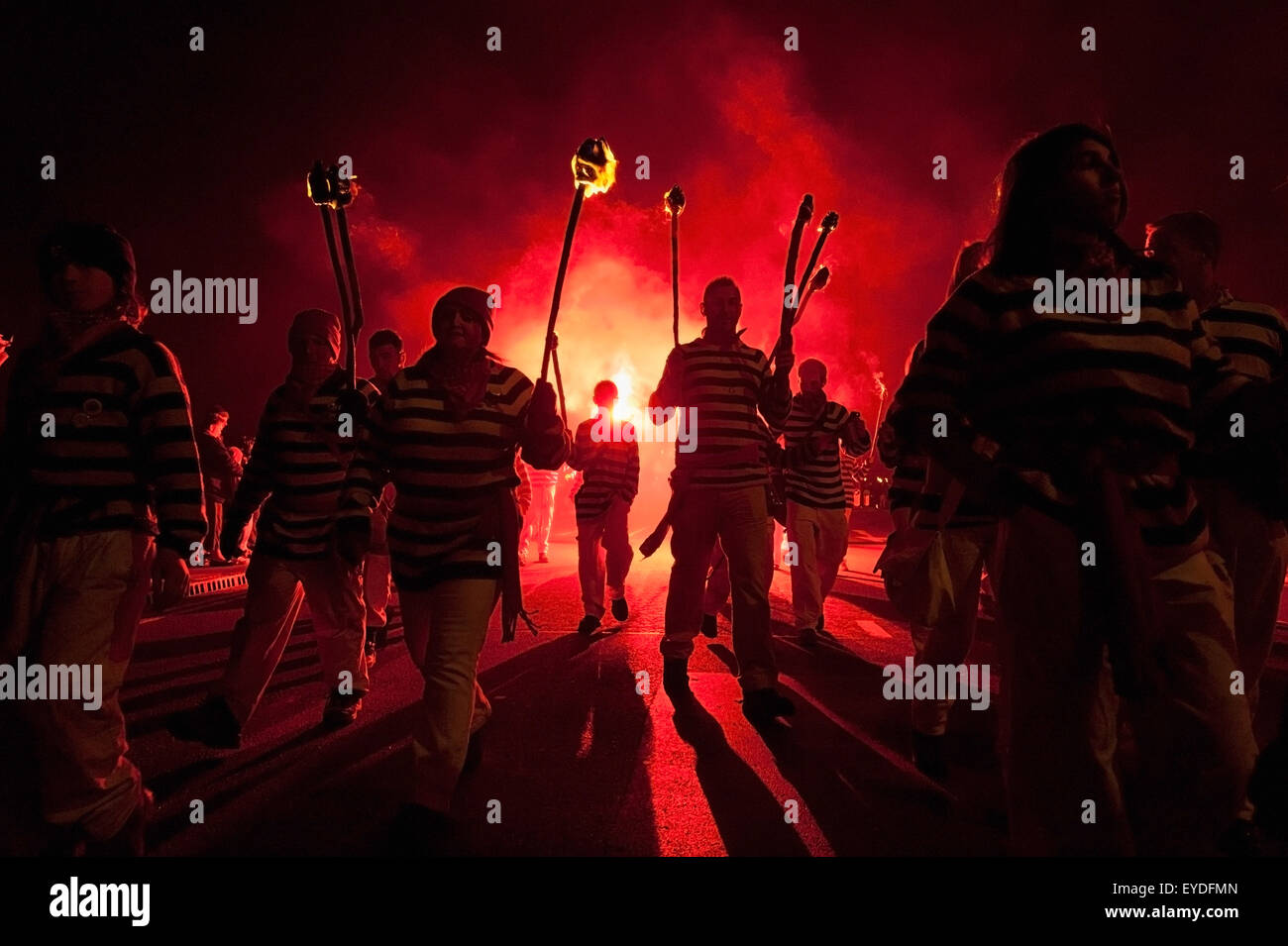 Members Of Borough Bonfire Society Lit From Behind By Flare Marching In ...