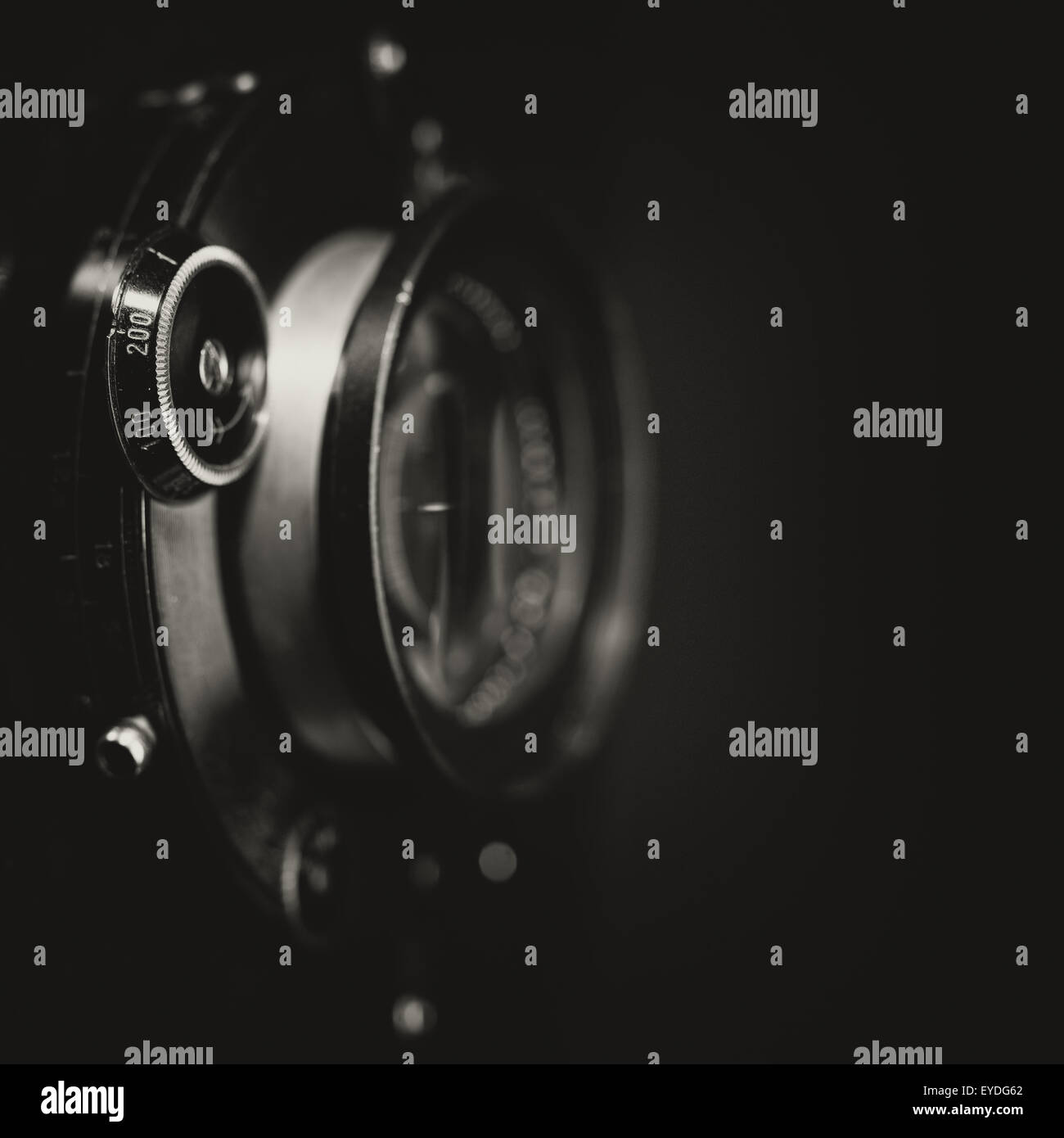 Retro view camera lens with vintage shutter, abstract techno ...