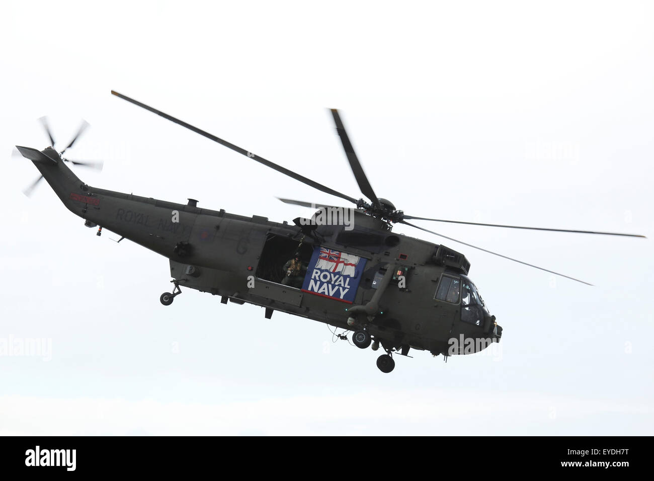 A Royal Navy Sea King Mk4 helicopter performs during a beach assault at ...