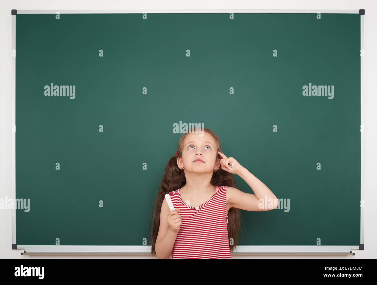 girl with chalk write on school board Stock Photo - Alamy