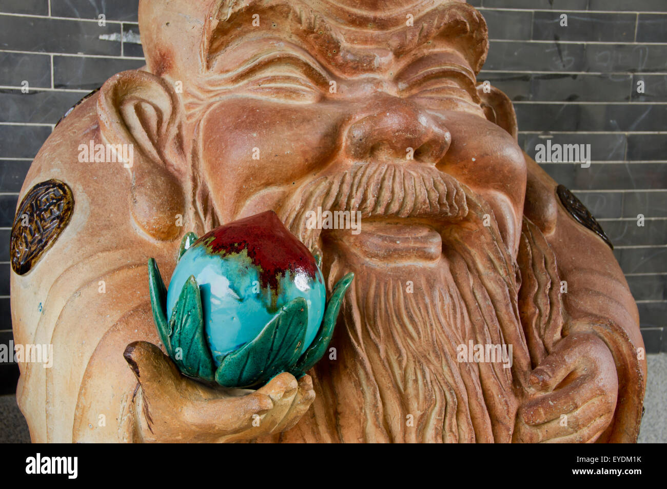 China, Guangdong, Dragon Kiln Nanfeng pottery; Foshan, Statue of ...