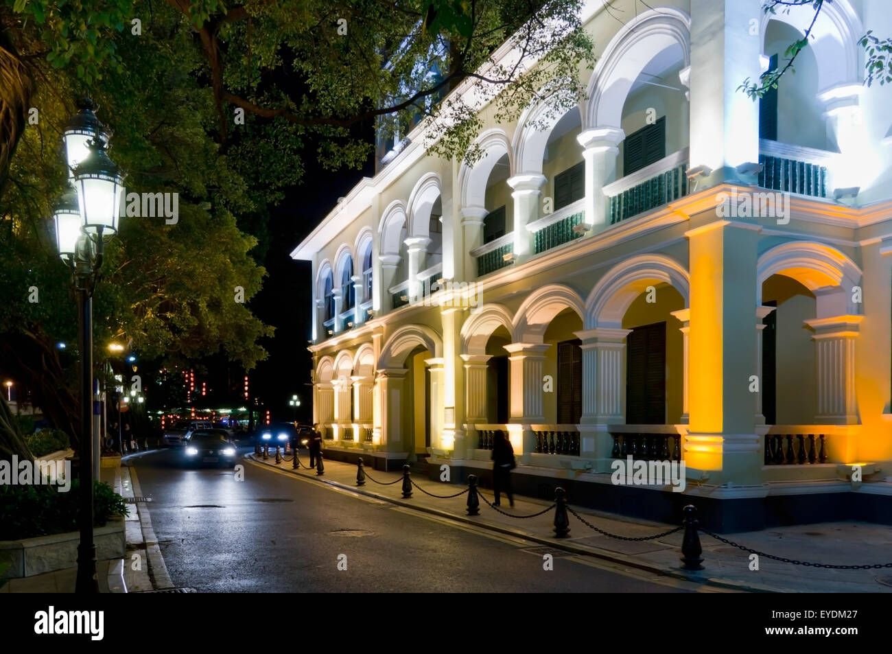 China, Guangdong, Shamian Island; Guangzhou, Building illuminated at ...