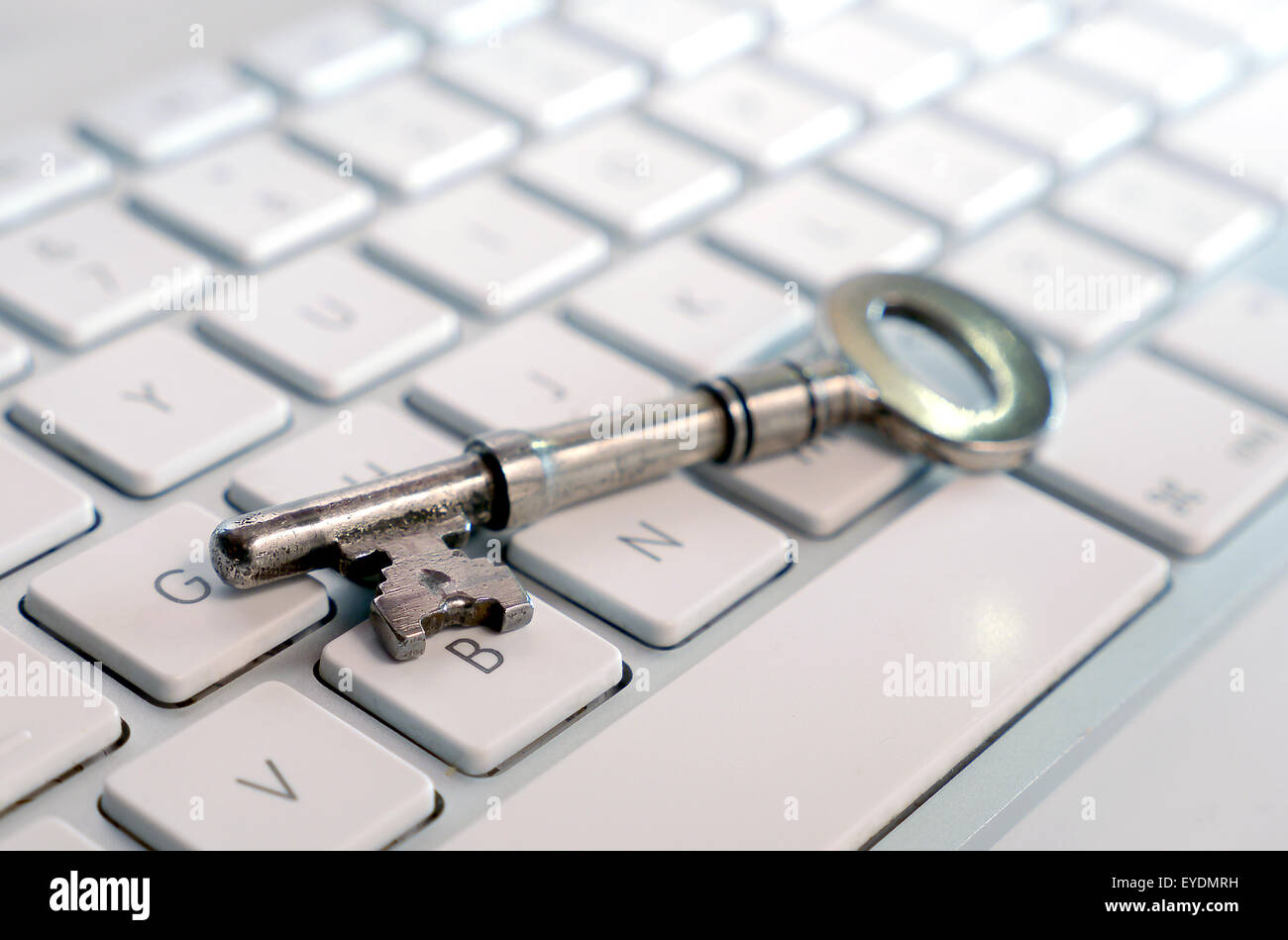 Old key on computer keyboard hi-res stock photography and images - Alamy