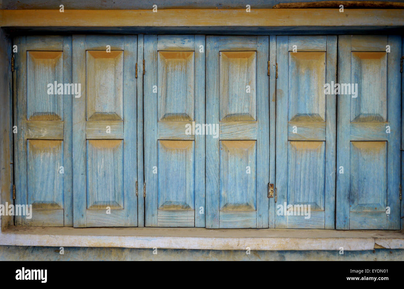 Faded blue wooden window shutters Stock Photo - Alamy