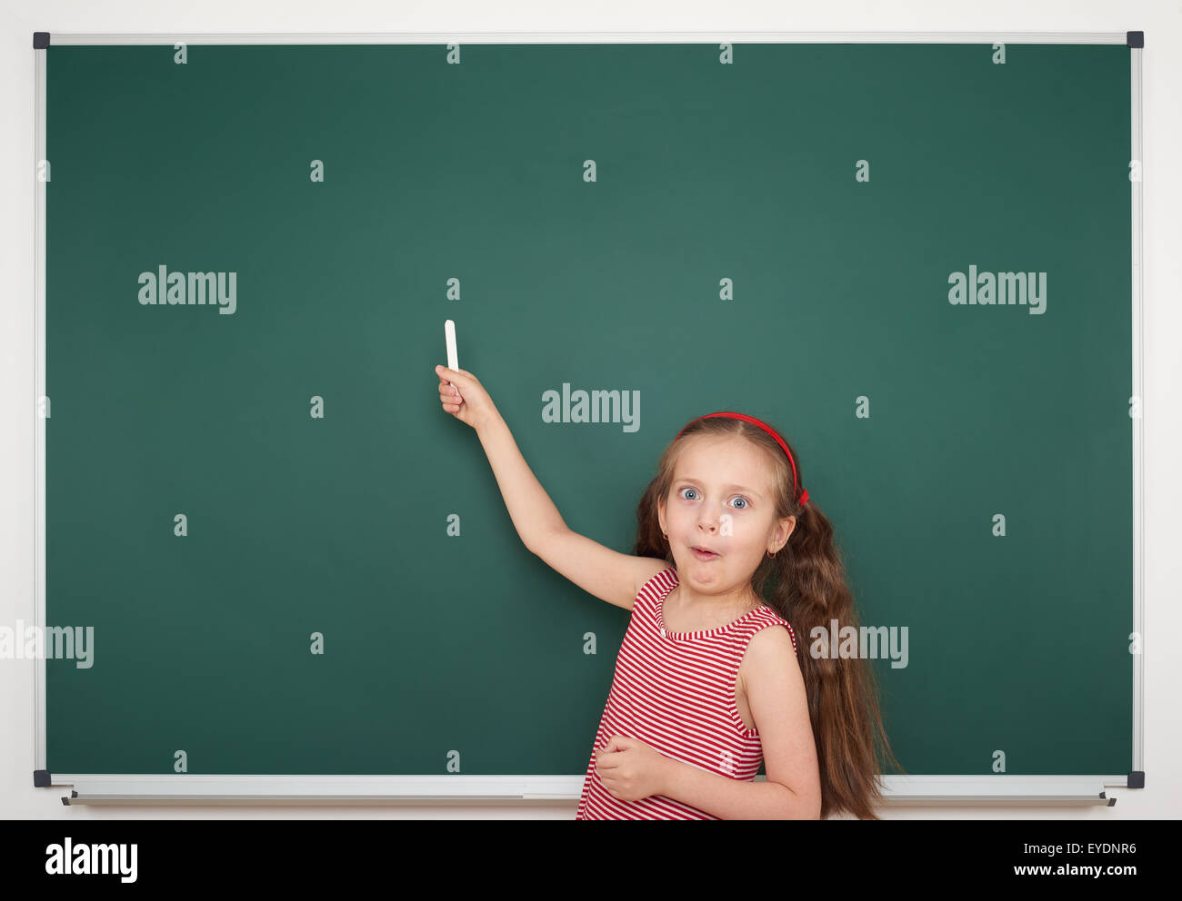 girl with chalk write on school board Stock Photo - Alamy