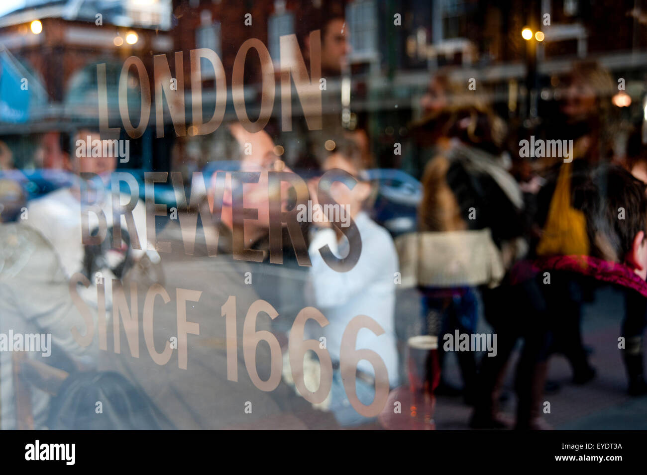 Reflections In The Ten Bells Window Glass Of Spitalfields Market And ...