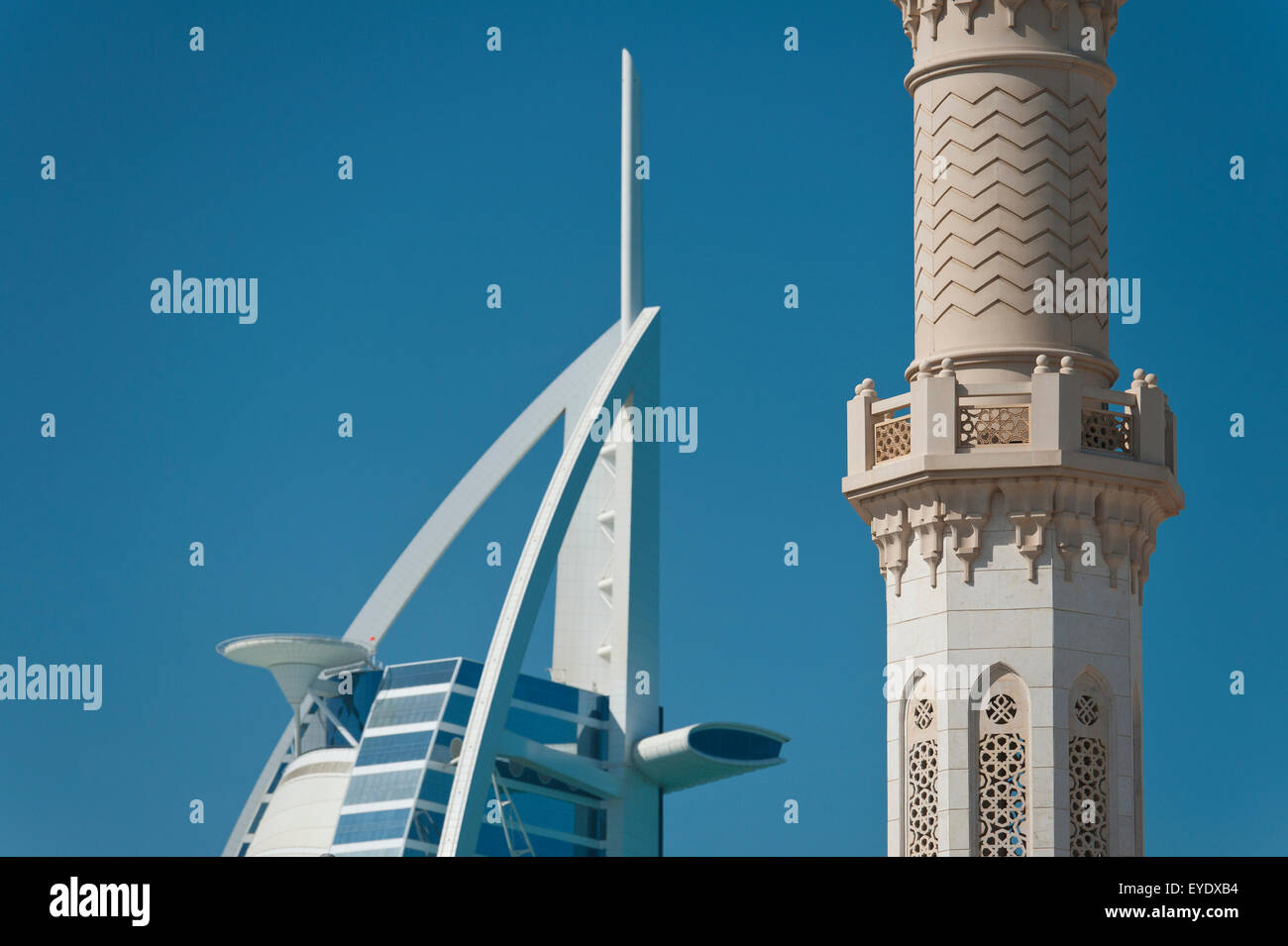 UAE, Detail of minaret of small mosque in front of Burj Al Arab hotel ...