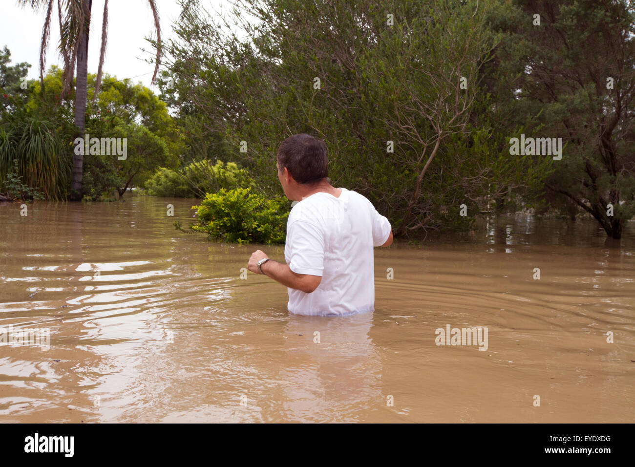 Walking through flood water hi-res stock photography and images - Alamy