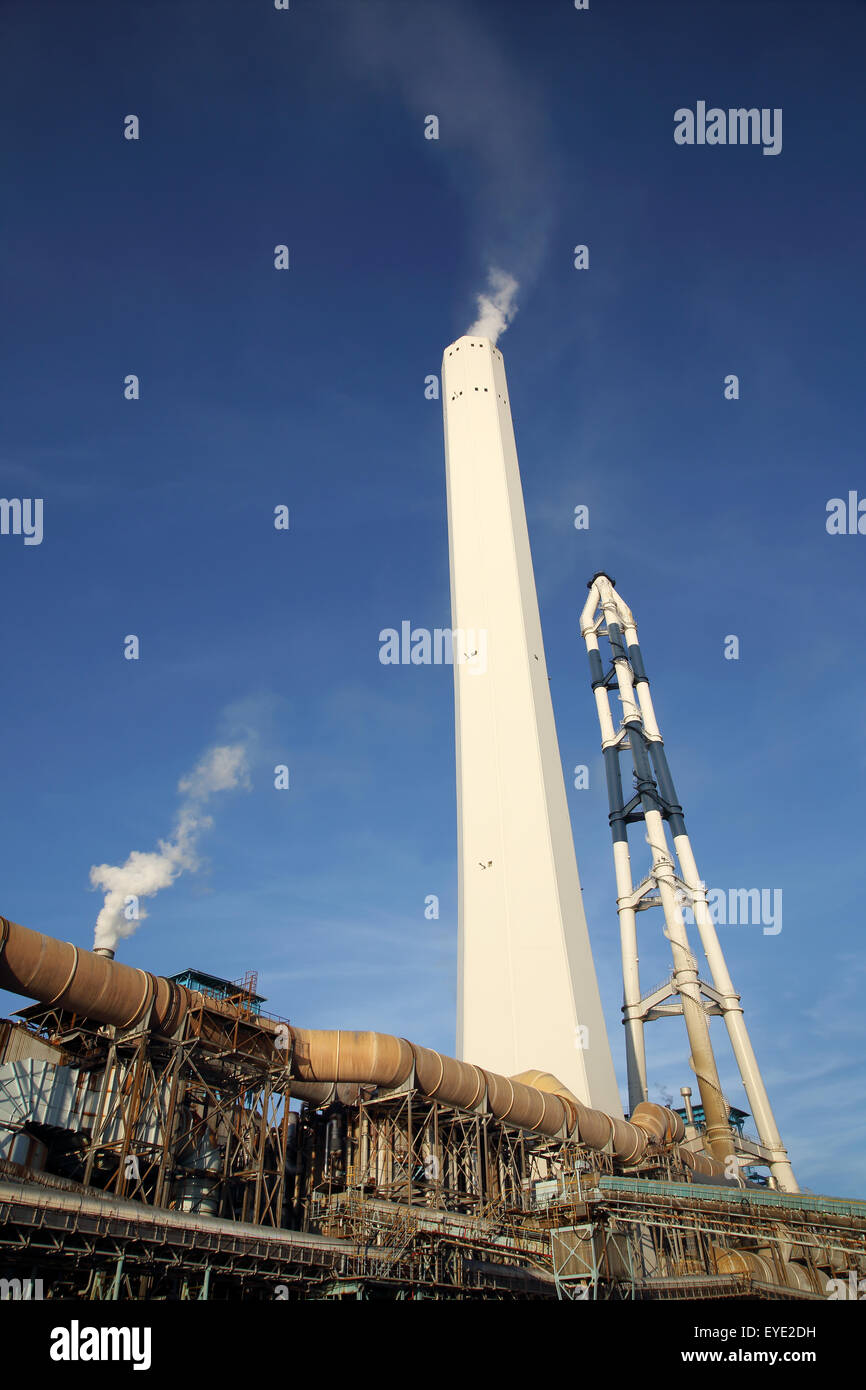 Industrial refinery plant with smoke stack Stock Photo - Alamy