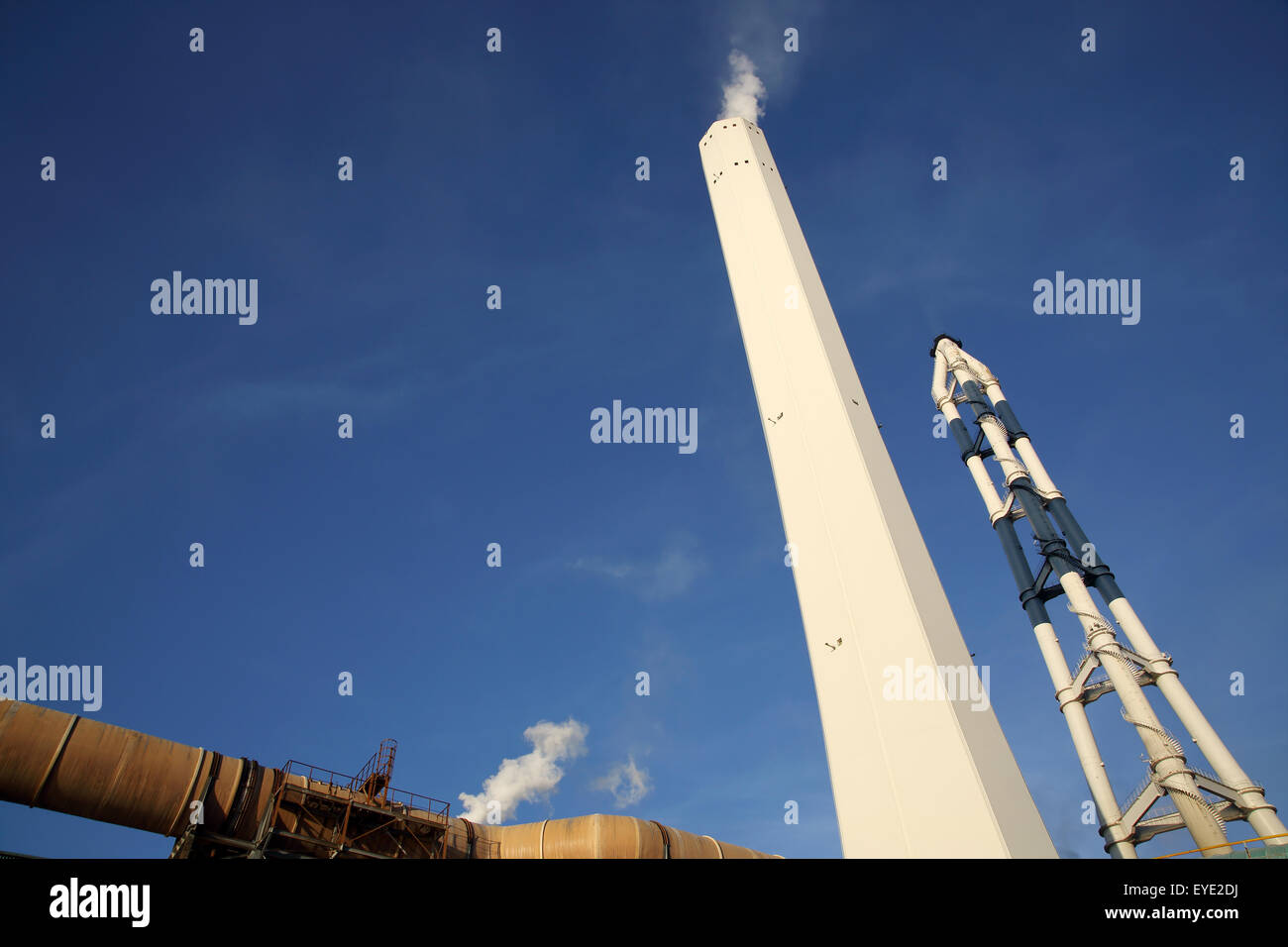 Industrial refinery plant with smoke stack Stock Photo - Alamy
