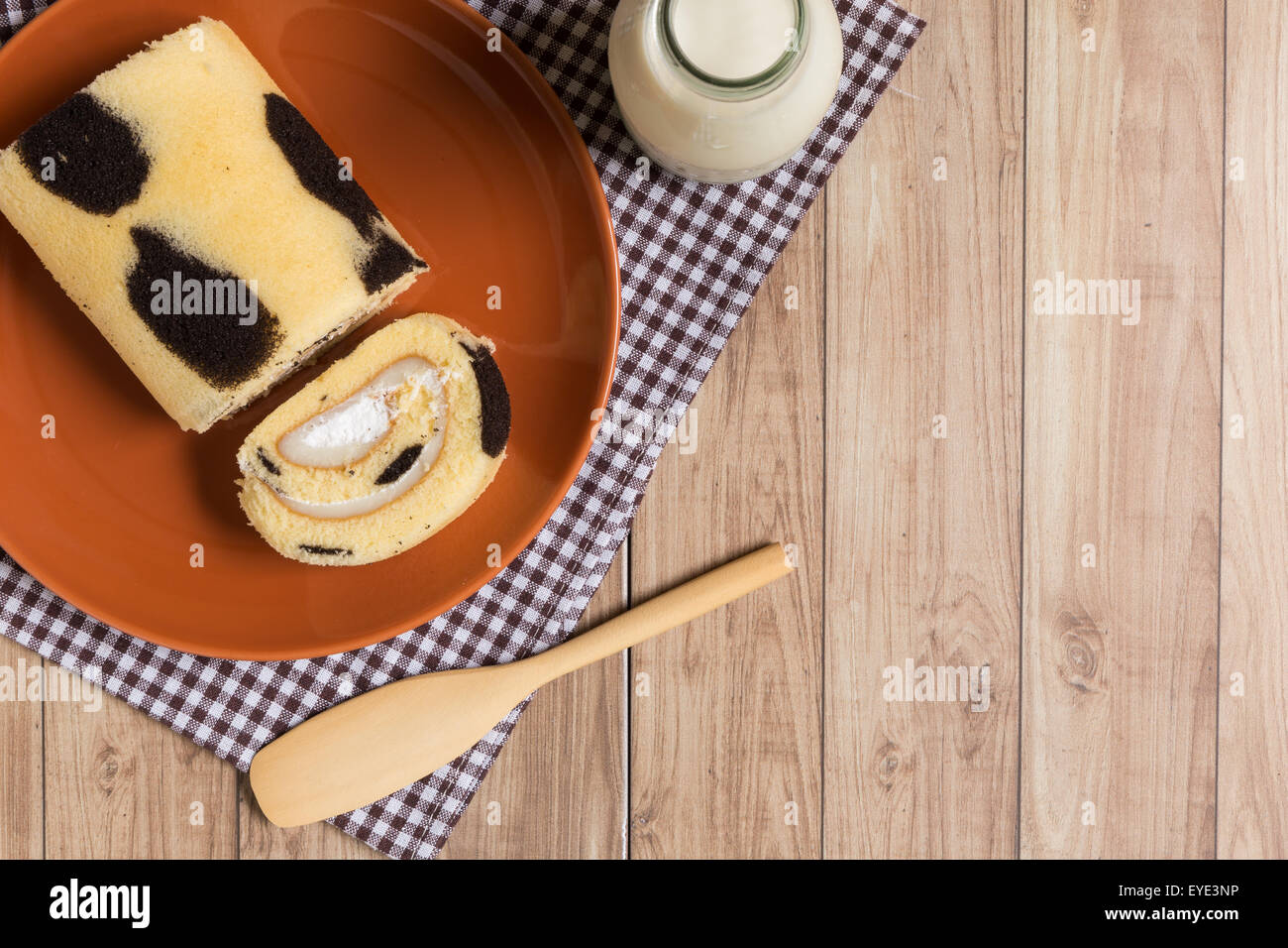 Cake roll with cow-skin pattern inserted with fresh milk cream Stock ...