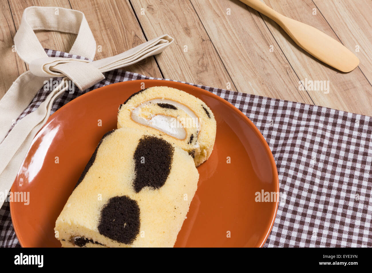 Cake roll with cow-skin pattern inserted with fresh milk cream Stock ...
