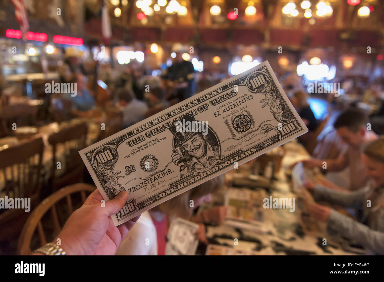 Human Hand Holding Menu Inside The Big Texan Steak Ranch Restaurant ...